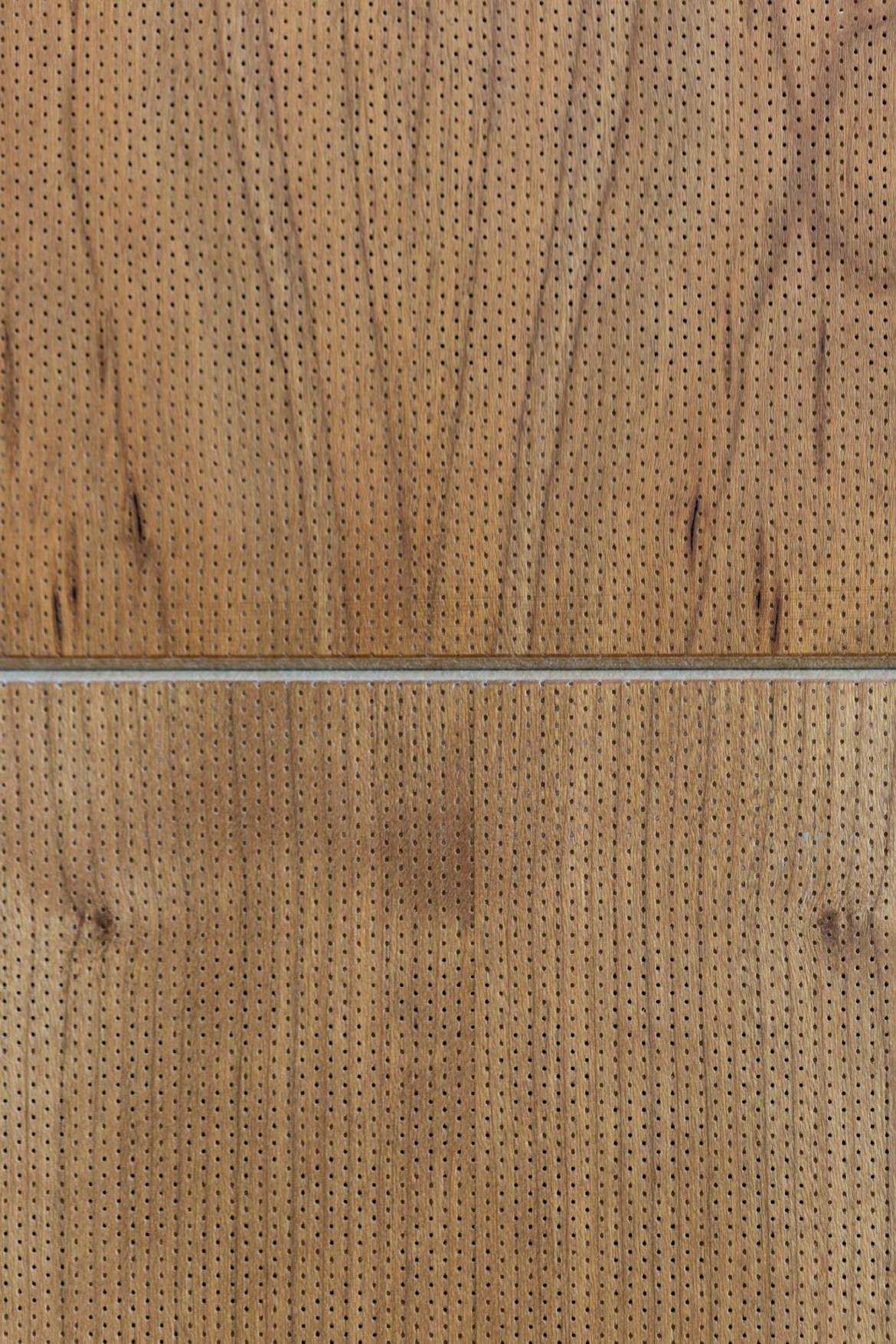Nano-perforated wood panels provide stylish entrance at University Dubai